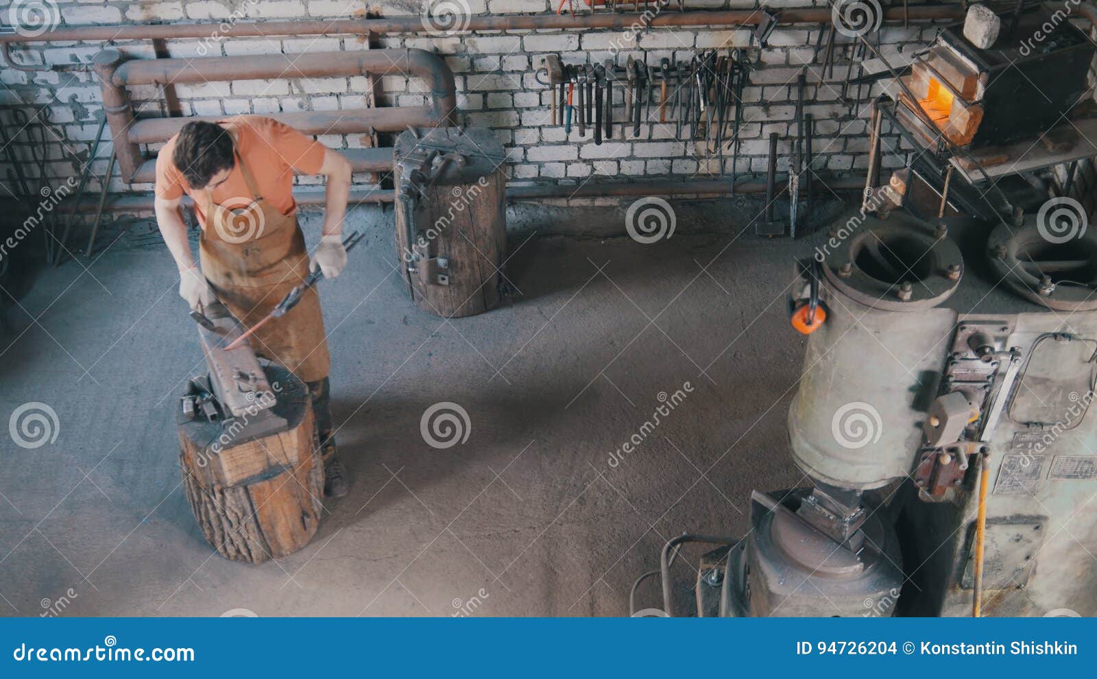 Beard Man Blacksmith in Forge Makes Metal Tools on Iron Anvil with ...