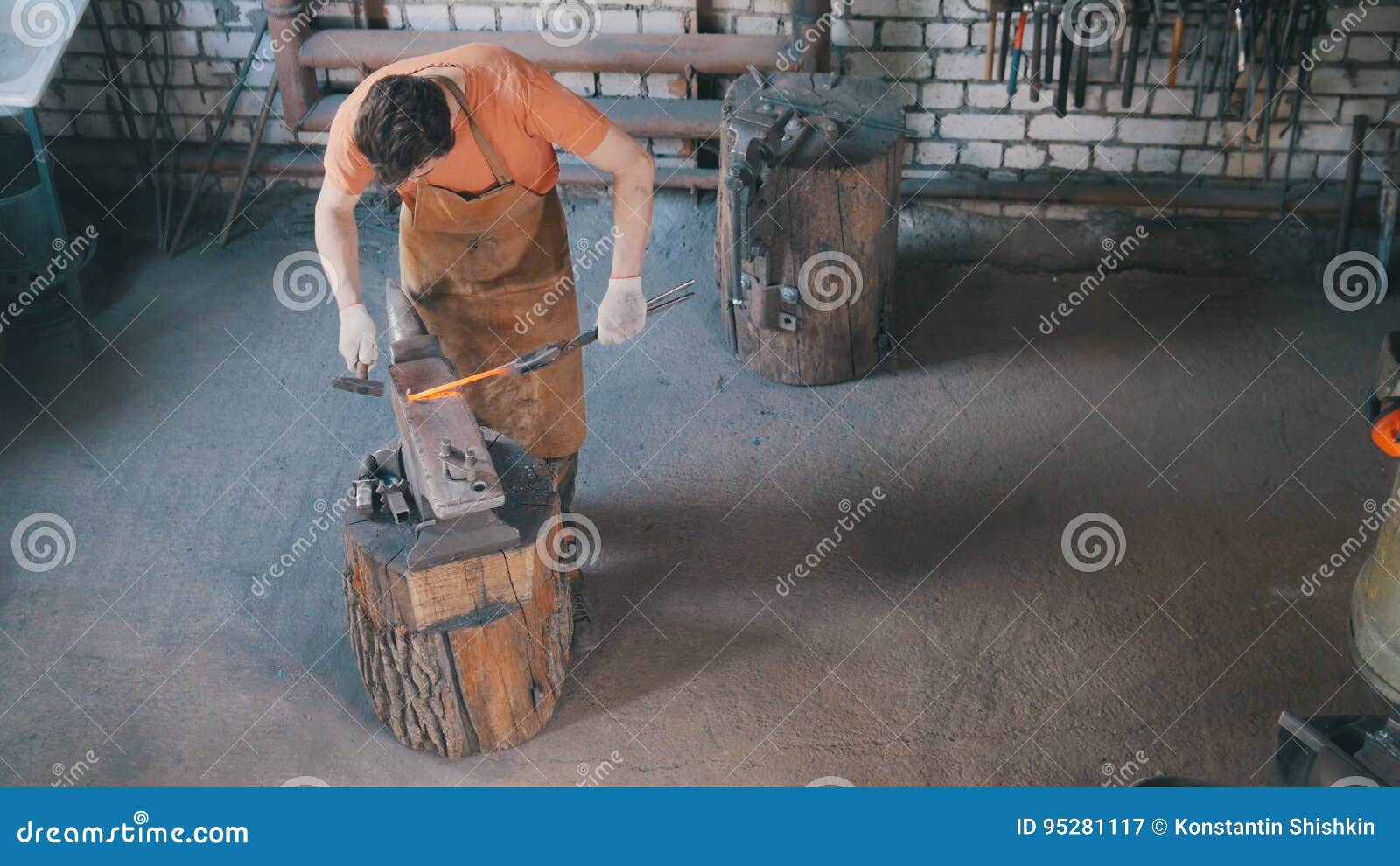 Beard Man Blacksmith in Forge Makes Metal Tools on Iron Anvil with ...