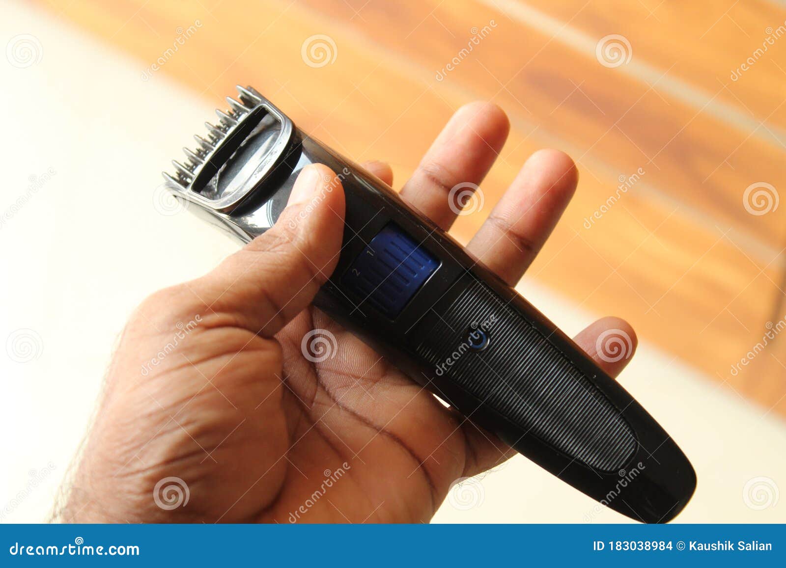 Beard Trimmer Blade or Razor Held in Hand Stock Photo - Image of adult ...