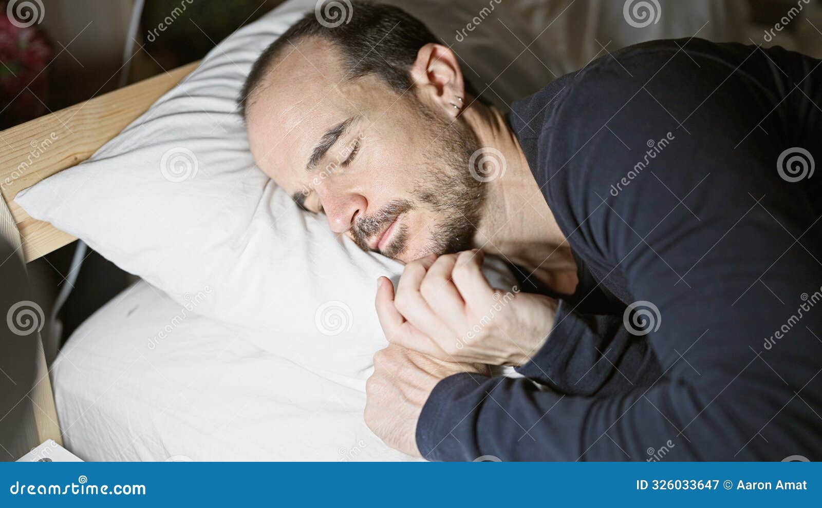 A Bearded, Balding Hispanic Man Sleeps Peacefully in a Bedroom Setting ...