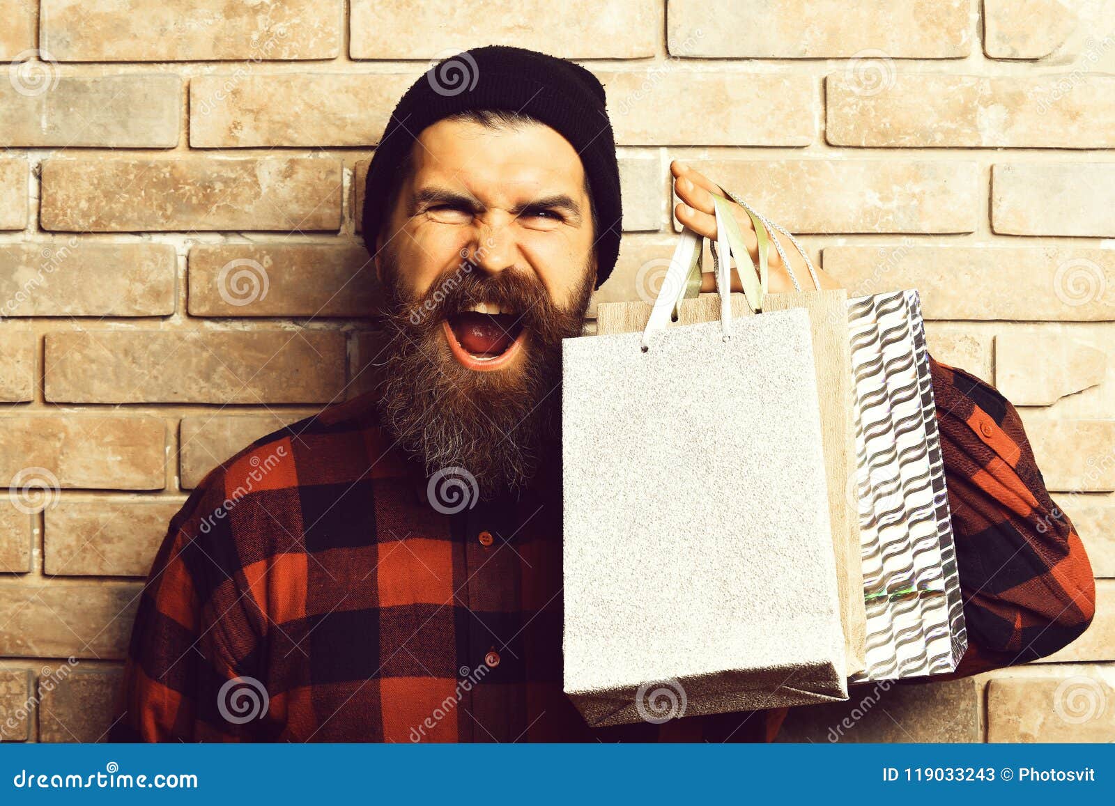 Bearded Brutal Caucasian Hipster with Moustache Holding Shopping ... Bearded Brutal Caucasian Hipster with Moustache Holding Shopping ...