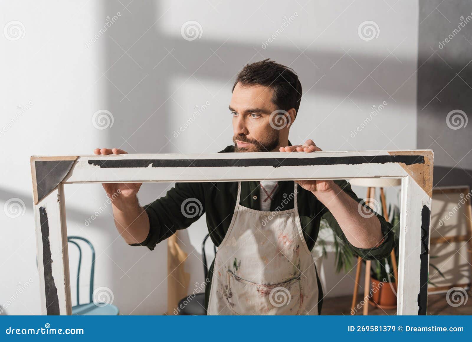 Bearded Carpenter in Apron Looking at Stock Image - Image of blur ...