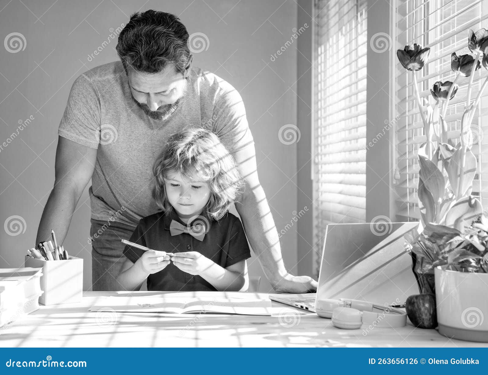 Bearded Daddy Writing School Homework with His Child Son in Classroom ...