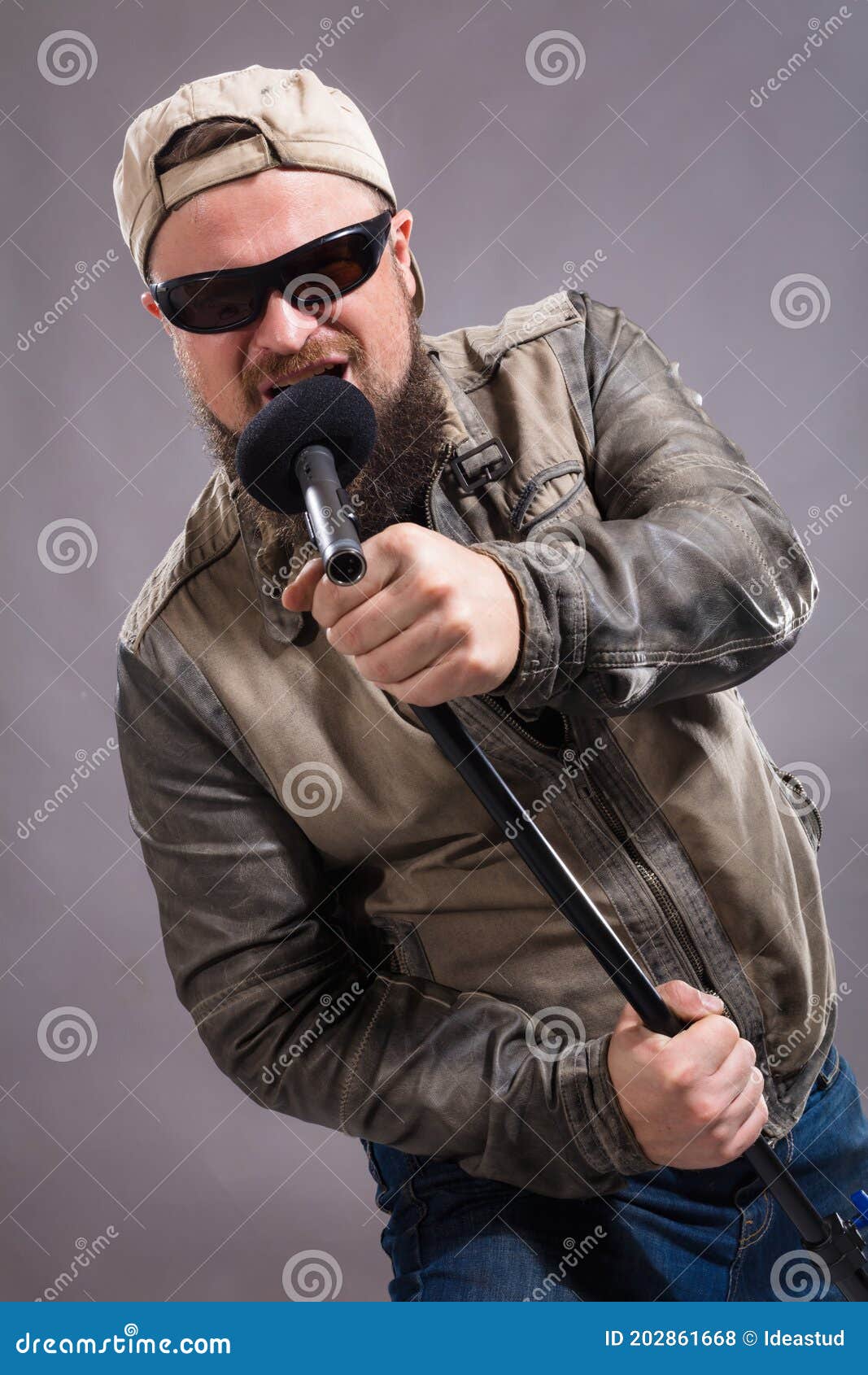 Bearded Emotional Rock Singer with Microphone Studio Portrait. Stock ...