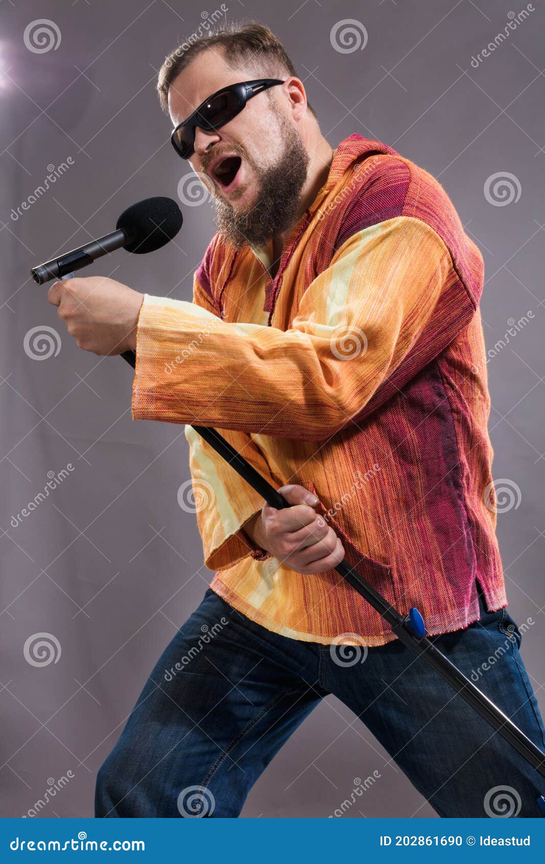 Bearded Emotional Rock Singer with Microphone Studio Portrait. Stock ...