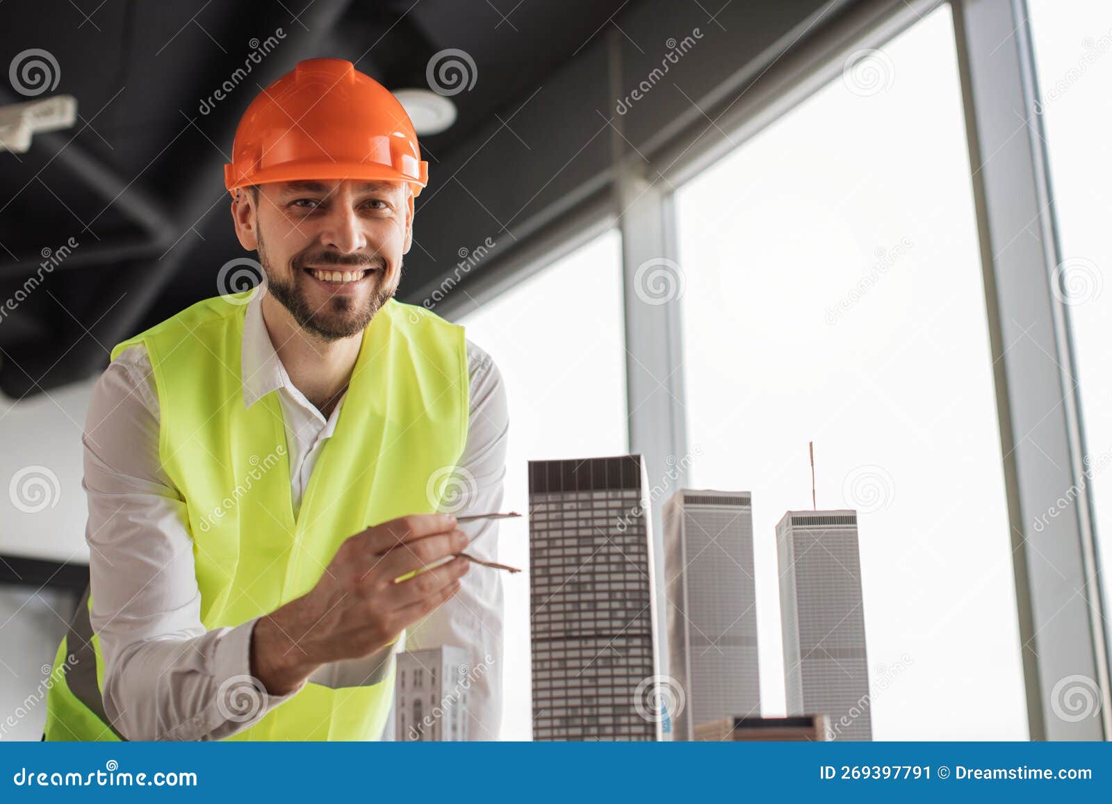 Bearded Engineer in Protective Helmet Working on Building Complex ...