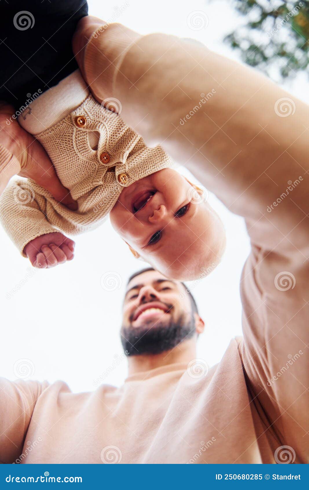 Bearded Father Playing with His Child Outdoors at Sunny Daytime ...