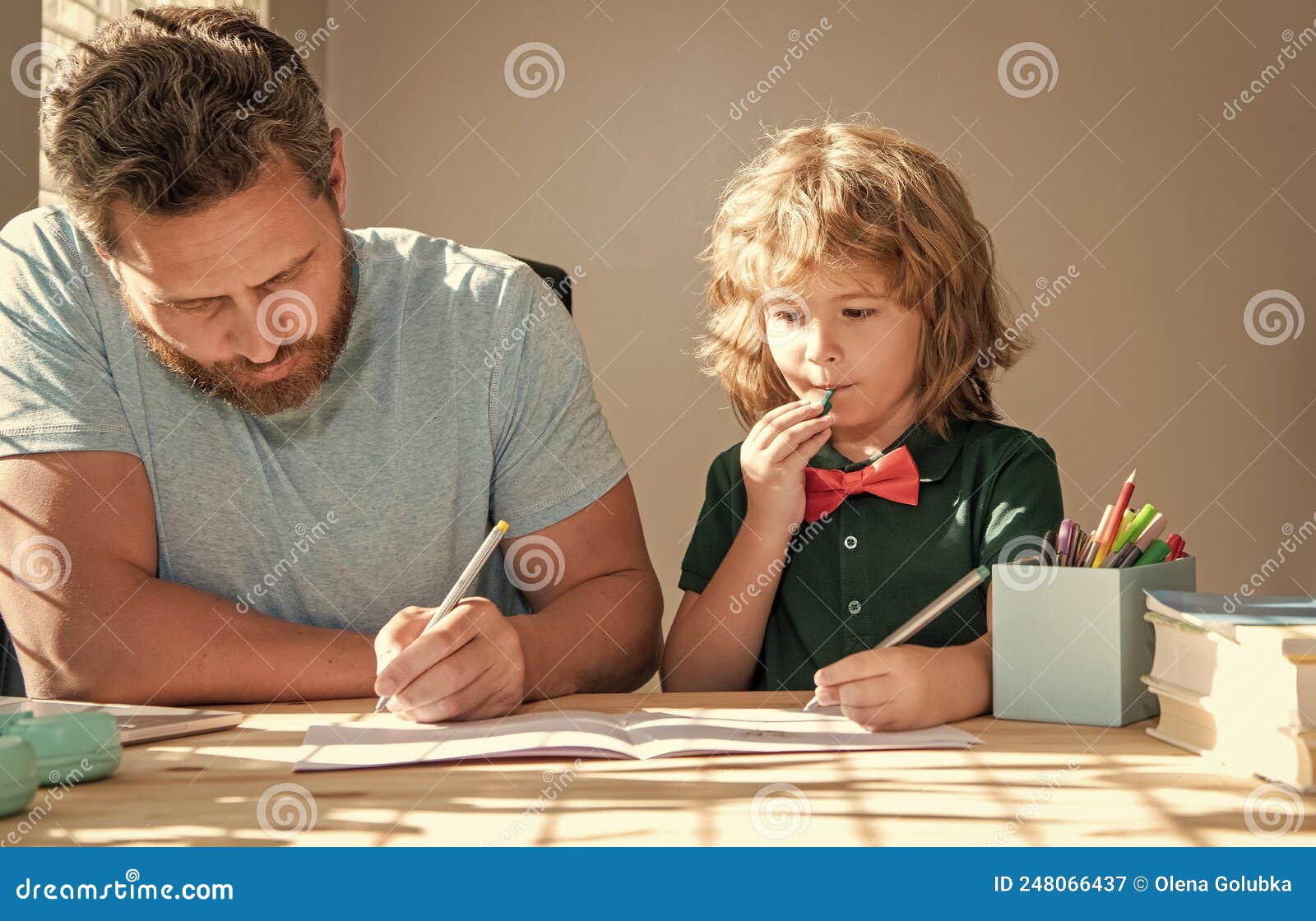 Bearded Father Writing School Homework with His Boy Son in Classroom ...