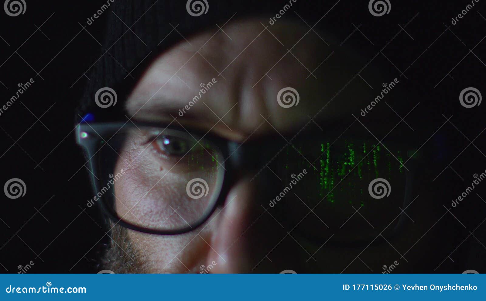 Bearded Hacker in Eyeglasses Working on Computer in the Night Green Programming Code Reflecting ...