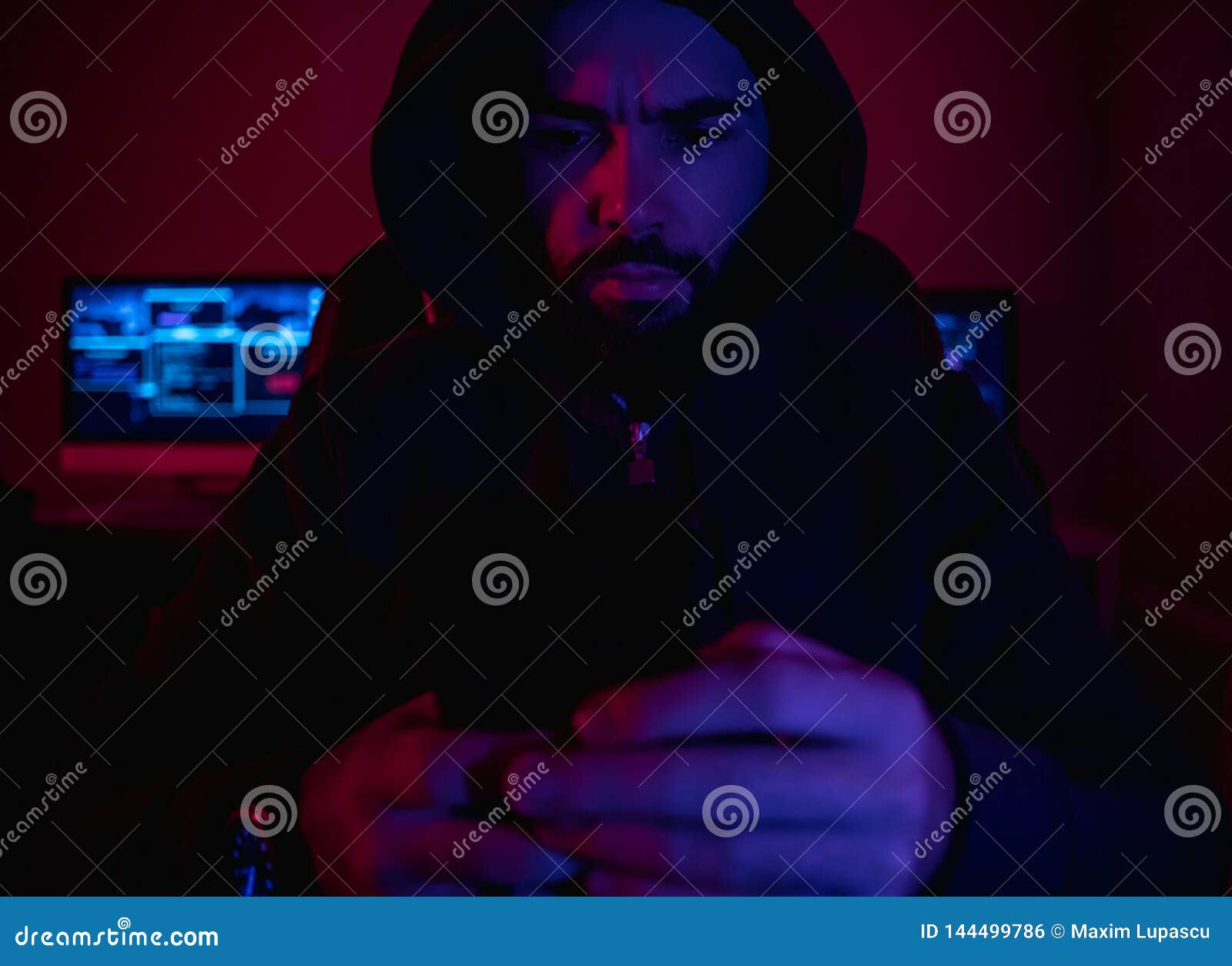 Bearded Hacker Using Smartphone in Dark Room Stock Photo - Image of ...