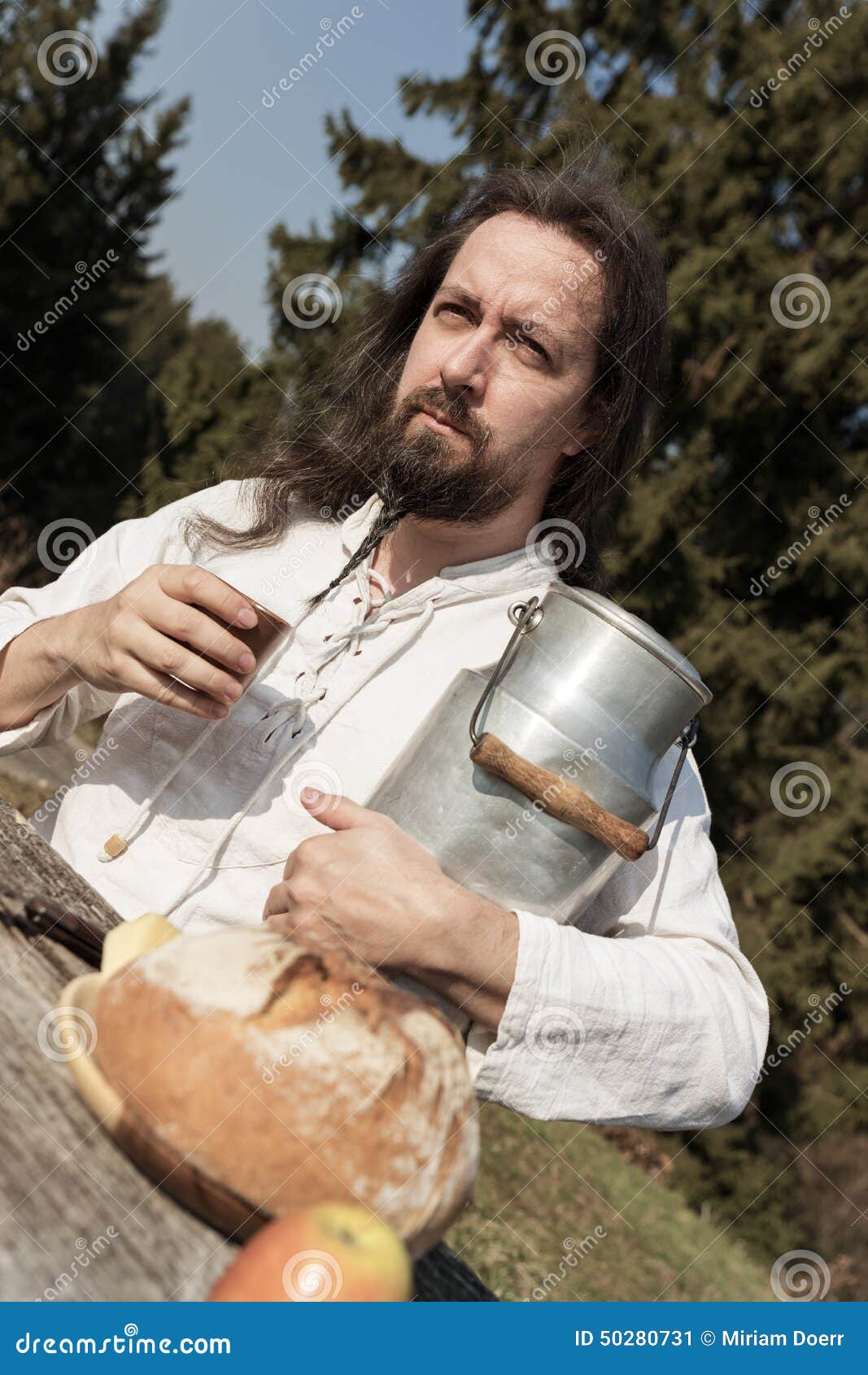 Bearded Hermit Eating Cheese and Bread in the Nature Stock Image ...