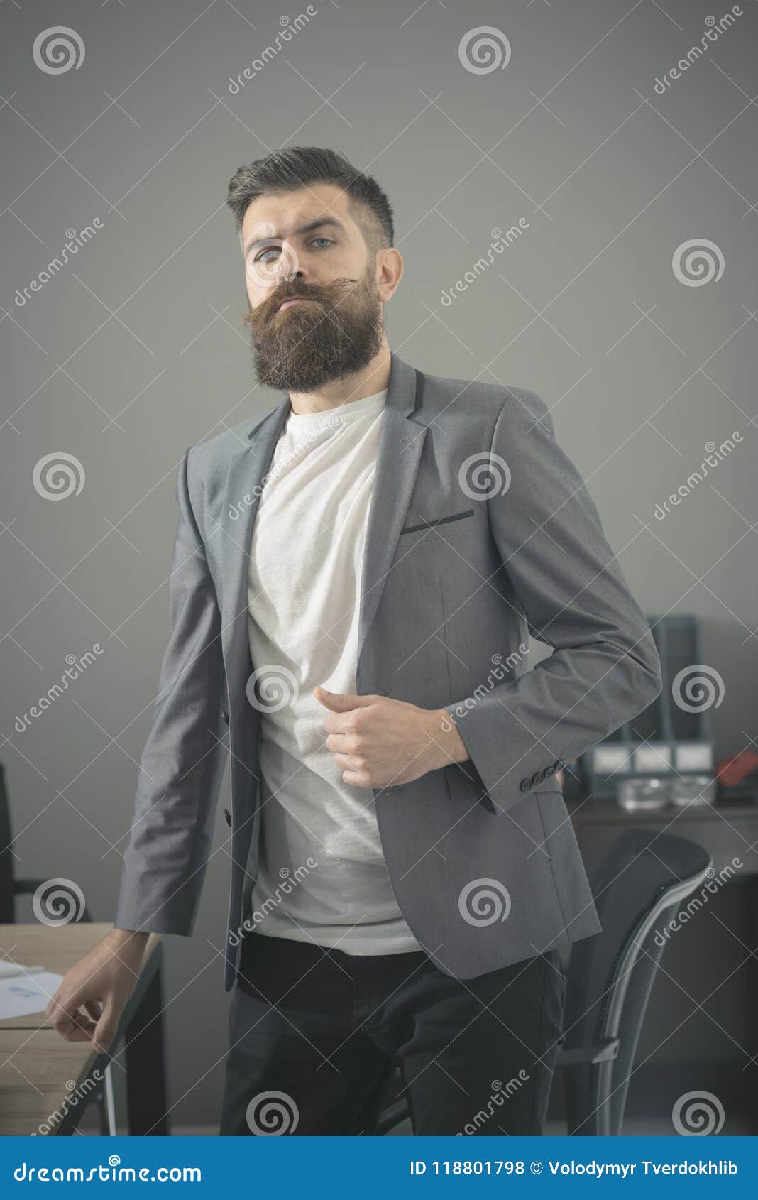 Bearded Man In Casual Suit In Office Man With Beard And Mustache On