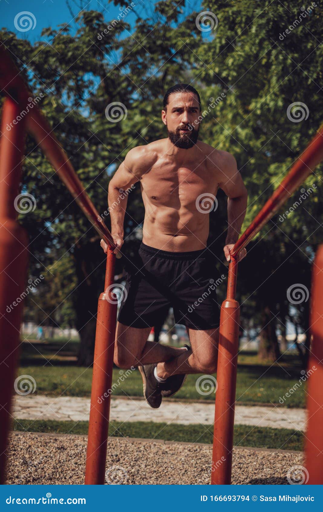 Bearded Man Doing Dips and Looking Ahead Stock Photo - Image of strong ...