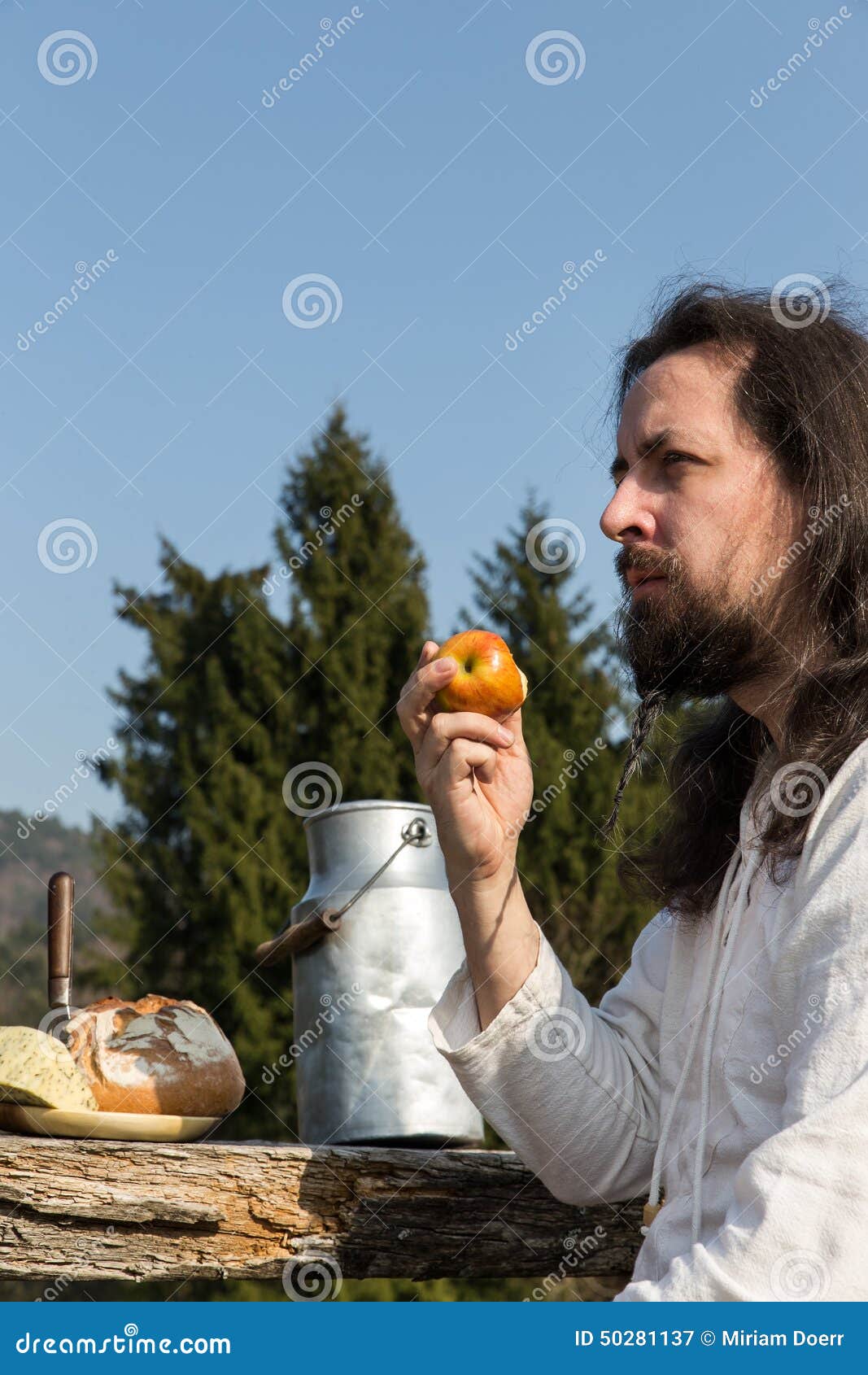 Bearded Man Eating an Apple in the Nature Stock Image - Image of ...