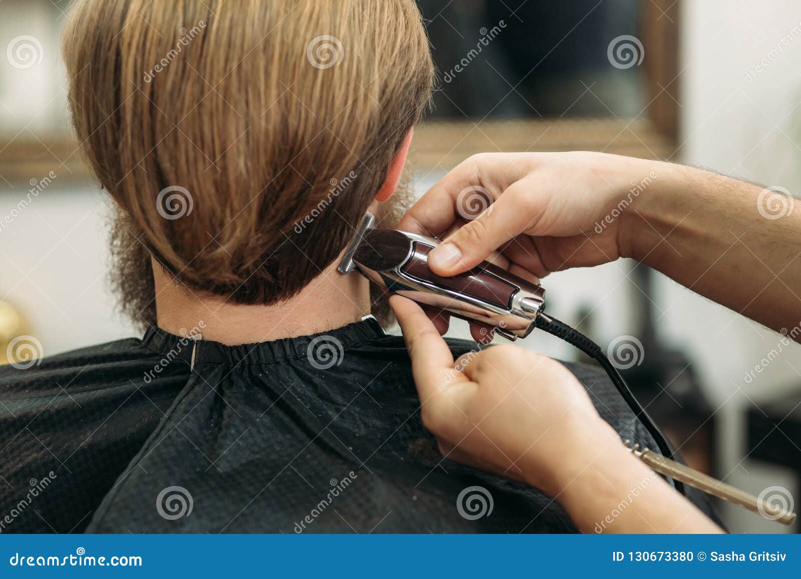 Bearded Man Having a Haircut with a Hair Clippers. Back View Stock ... Bearded Man Having a Haircut with a Hair Clippers. Back View Stock ...