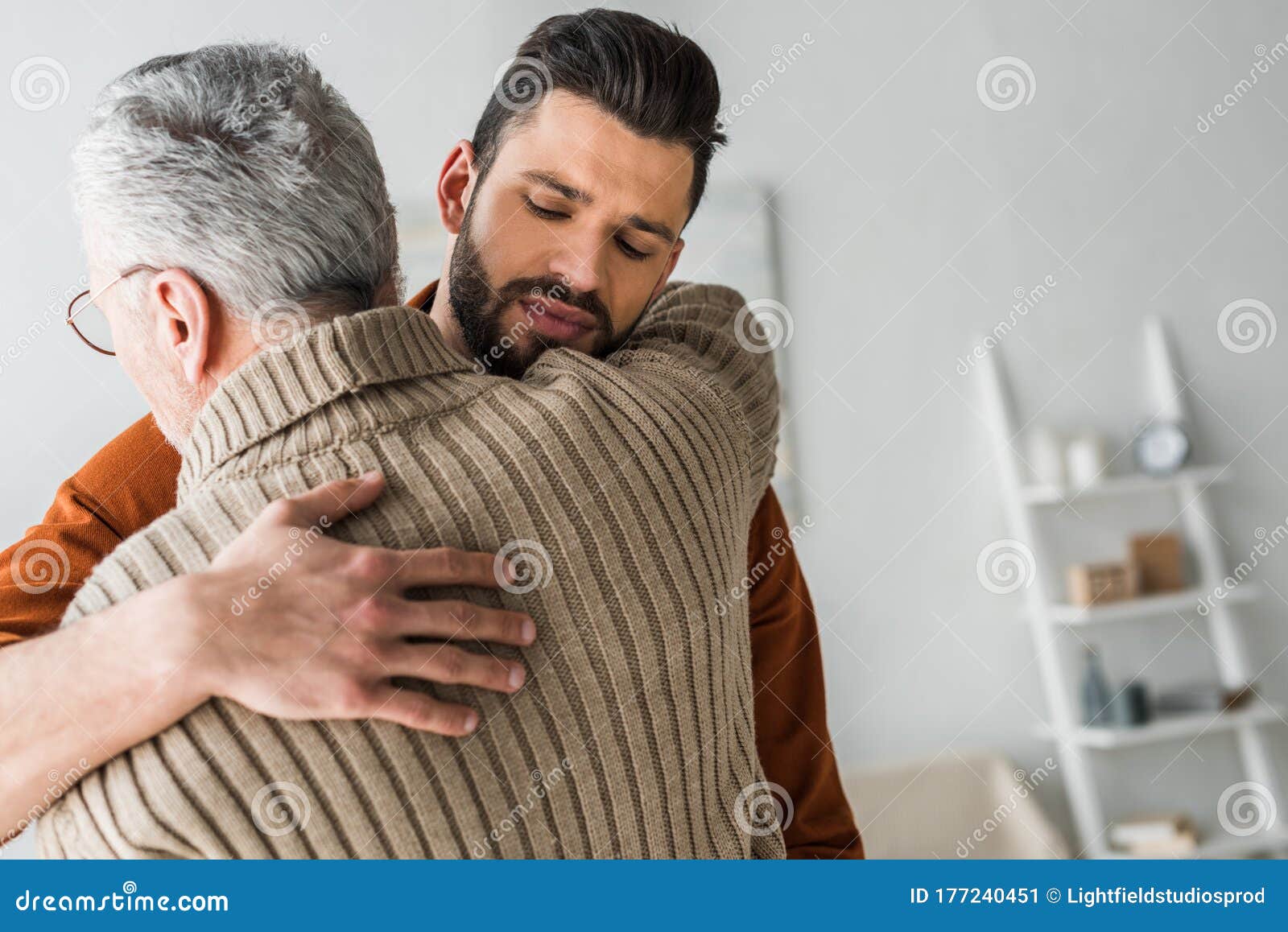 Bearded Man Hugging Elder Father at Home Stock Image - Image of elderly ...