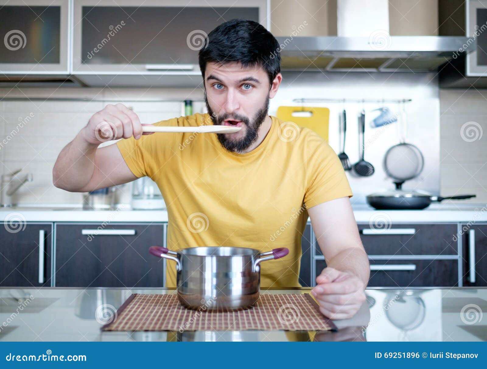 Bearded man in the kitchen stock photo. Image of shirt - 69251896