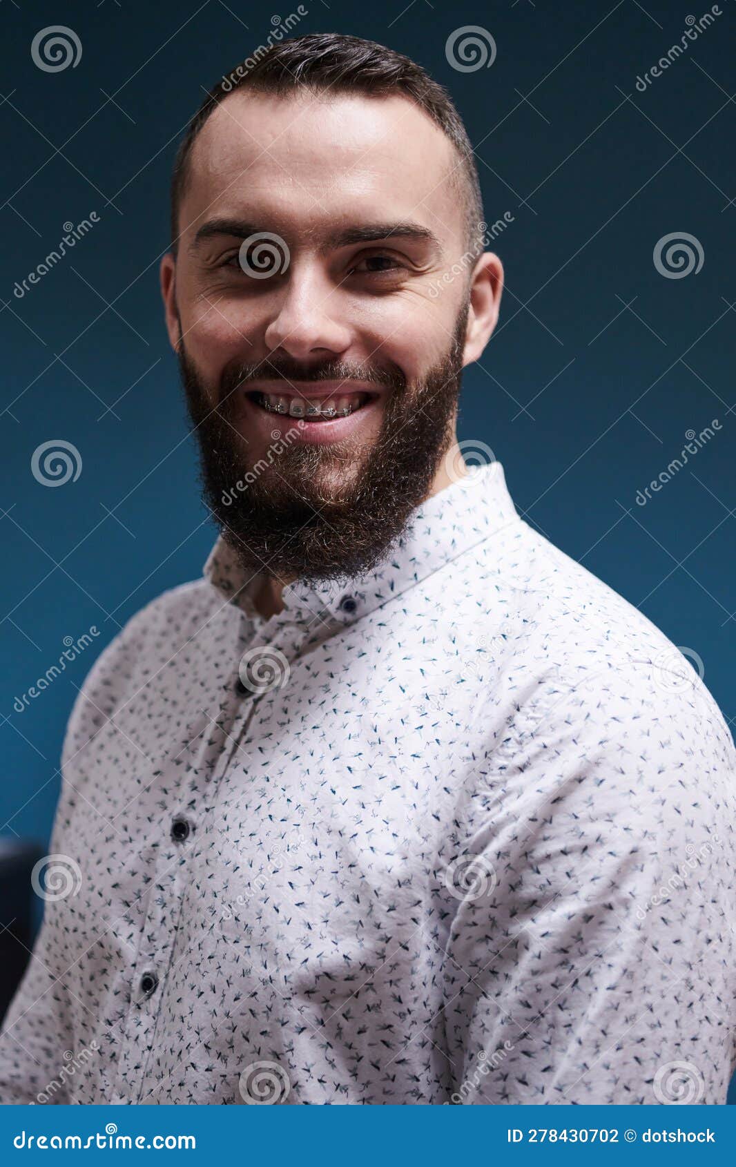 A Bearded Man in a Modern Robotics Laboratory, Immersed in Research and ...