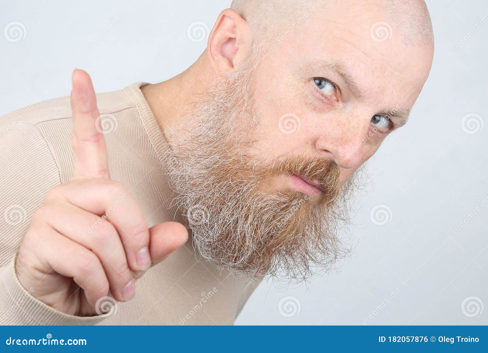 Bearded Man with Raised Index Finger Stock Photo - Image of person ...