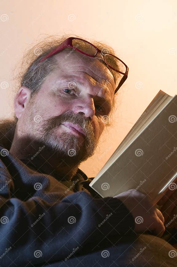 Bearded man reading book stock photo. Image of caucasian - 18552772