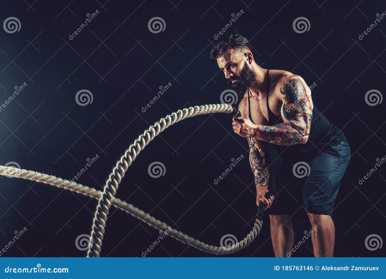 Men with Rope in Functional Training. Studio Shot, Isolate Stock Photo ...