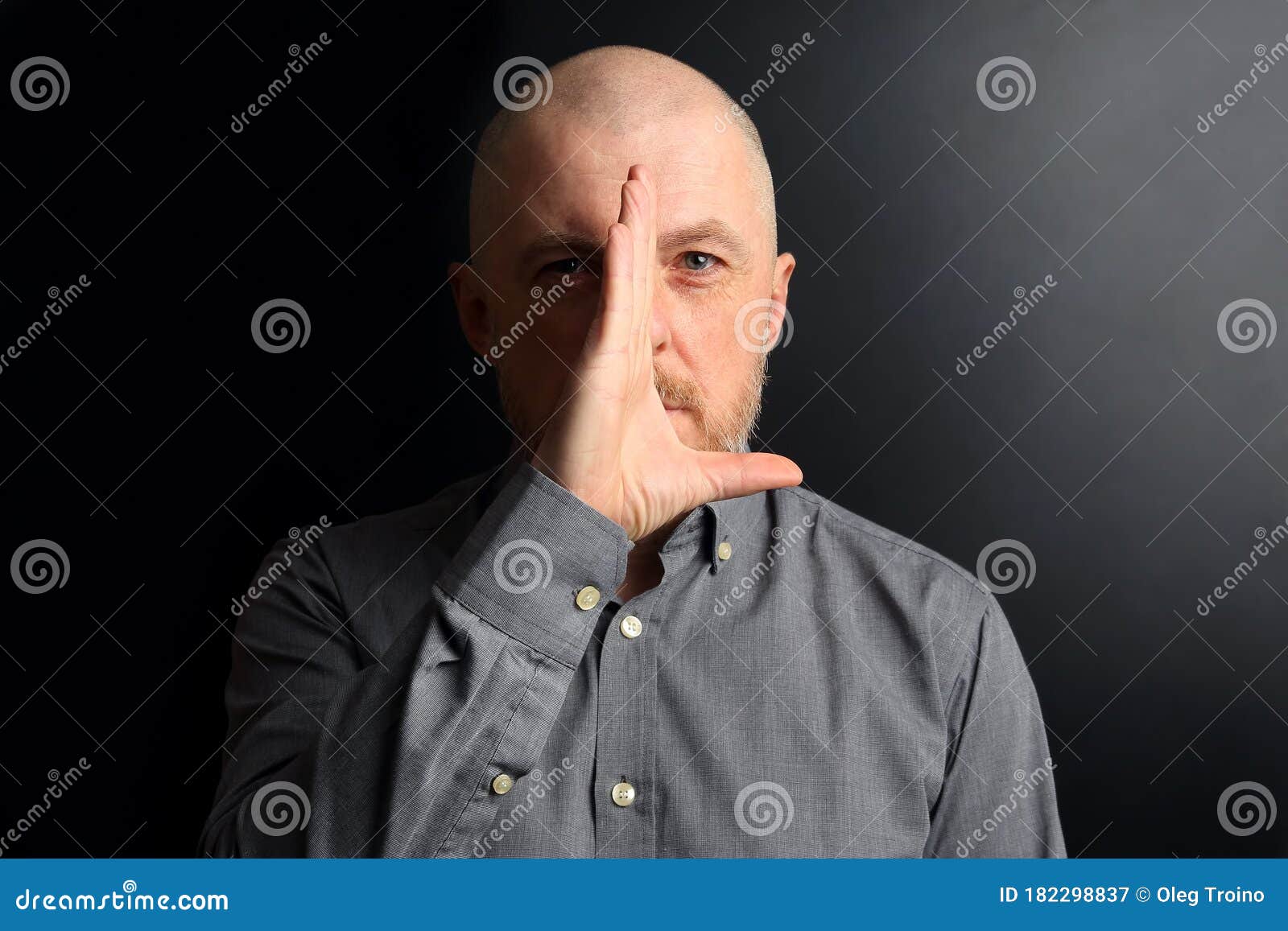 Bearded Man Shielded Half of His Face from the Light with His Palm ...