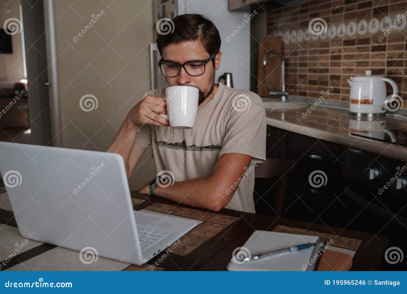 Bearded Man Sitting at Table Drink Coffee Work at Laptop Thinking of ...