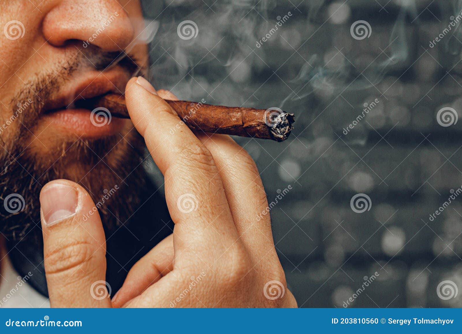Bearded Man Smoking Cigar Against Black Brick Wall Stock Photo - Image ...