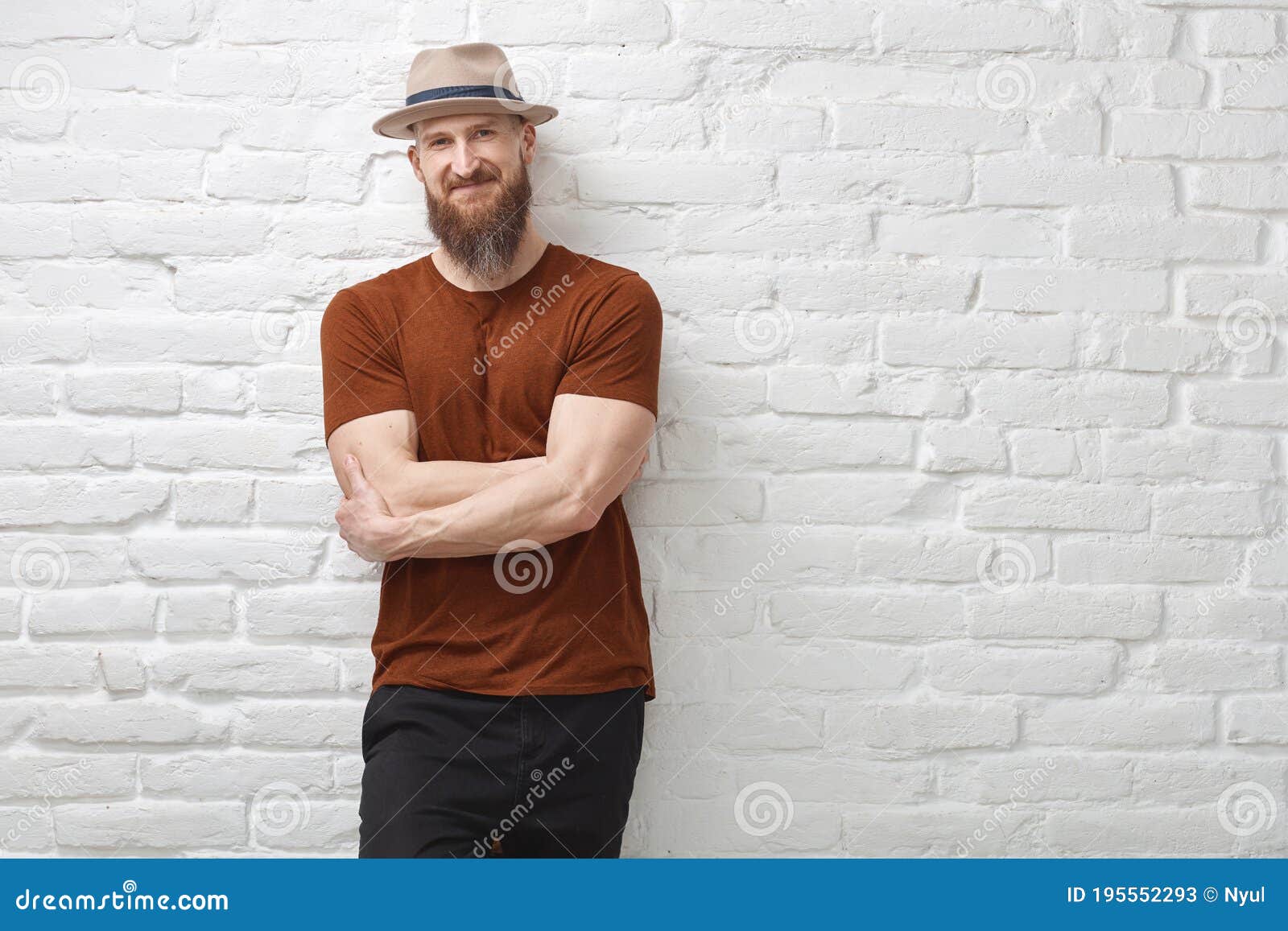 Bearded Man Standing Against White Wall Stock Image - Image of ...