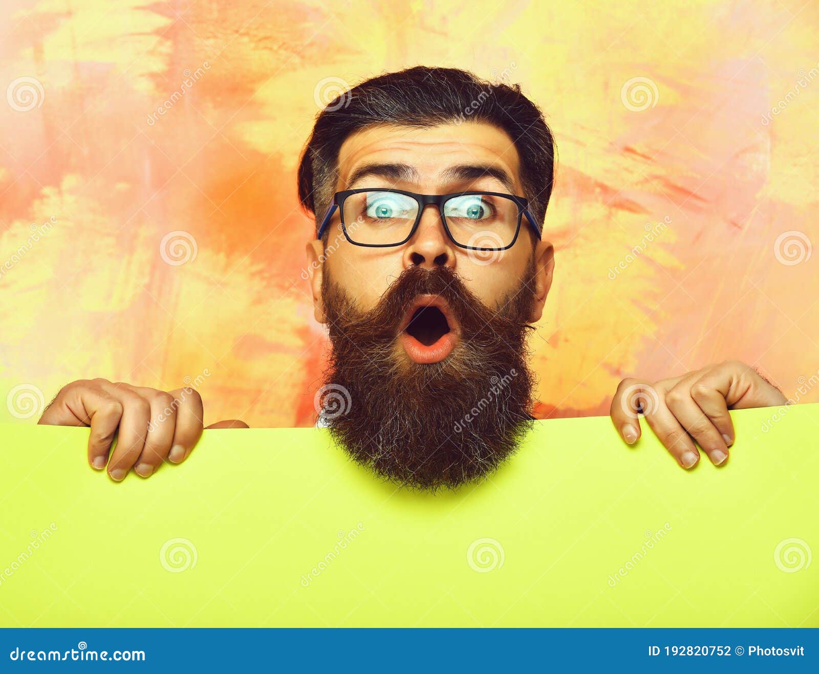 Bearded Man With Surprised Face In Glasses On Colorful Background Stock
