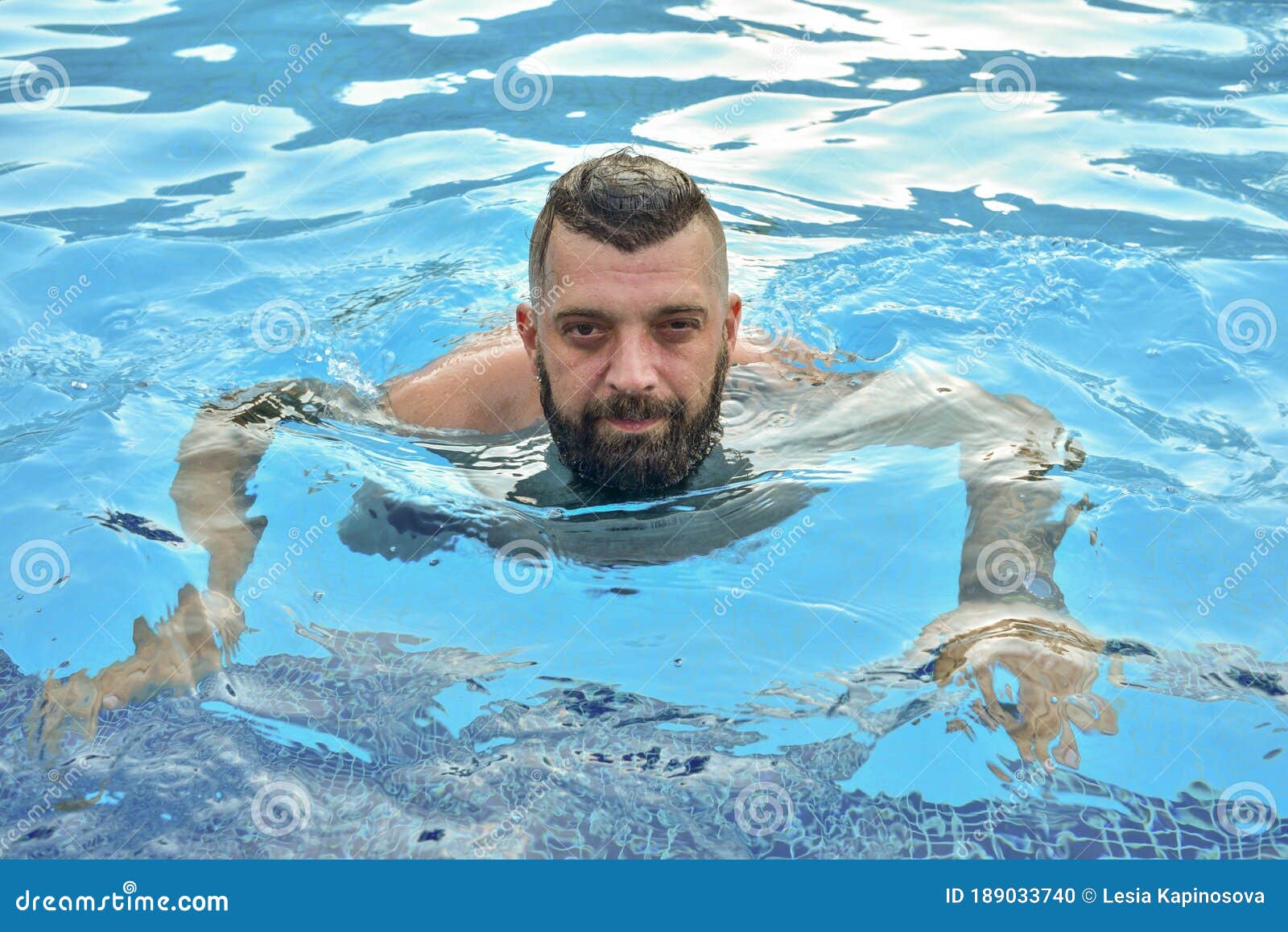 Bearded Man Swimming in a Pool. Man with a Beard in the Pool Stock ...