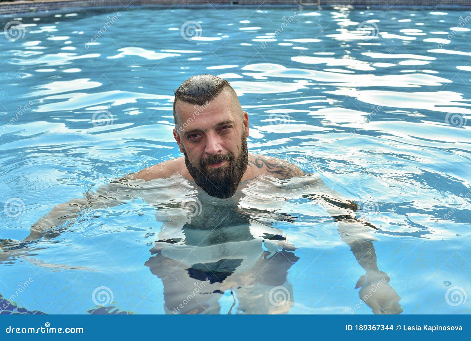 Bearded Man Swimming in a Pool. Man with a Beard in the Pool Stock ...