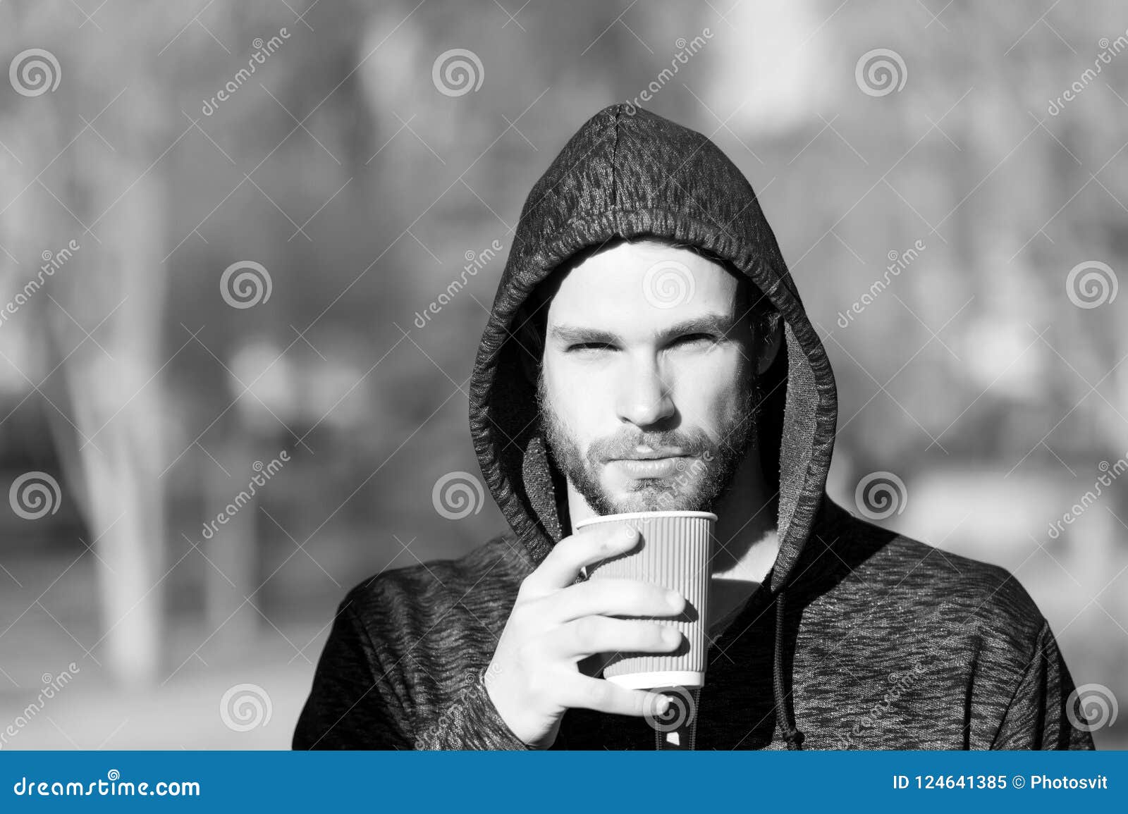 Bearded Man With Takeaway Drink In Sunny Park Macho In Hood Hold