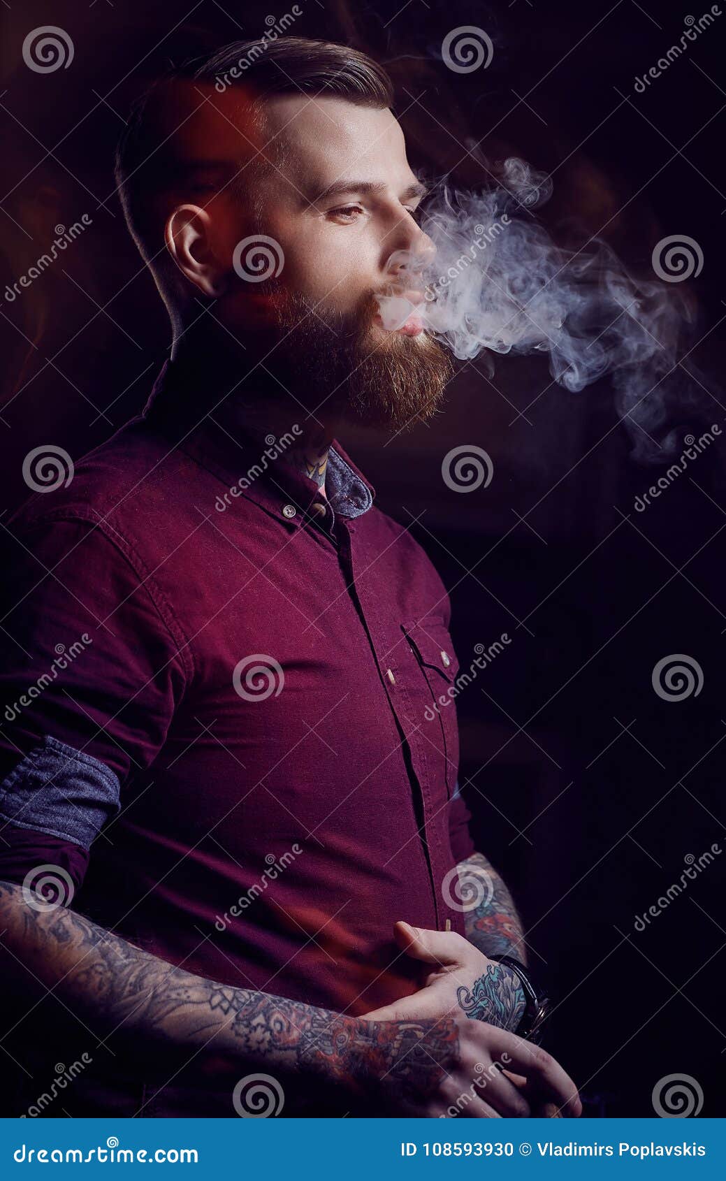 Bearded Man with Tattooes on His Arms Smoking. Stock Photo - Image of ...