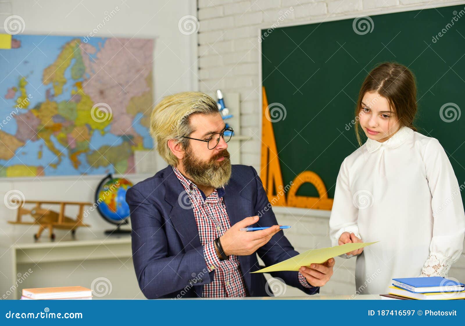 Bearded Man Teacher in Classroom. Teacher Checking Right Answer. Track ...