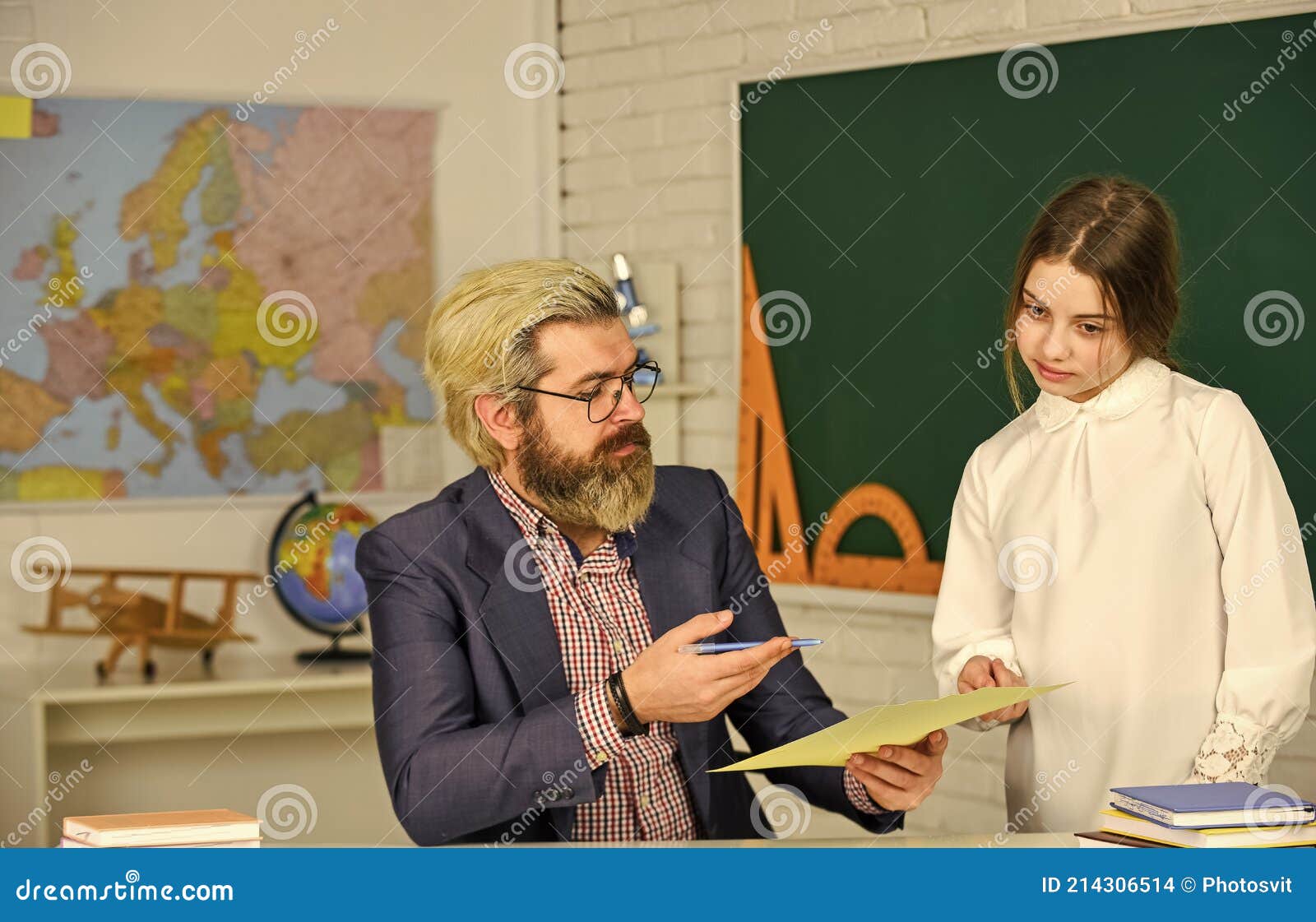 Bearded Man Teacher in Classroom. Teacher Checking Right Answer. Track ...