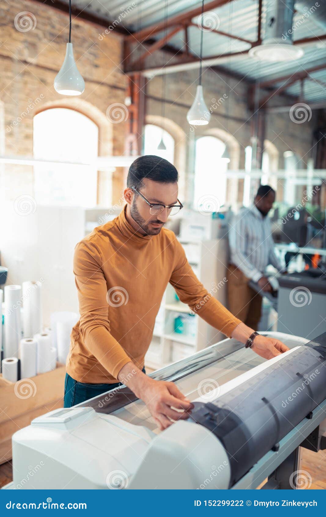 Bearded Man Using Big Printer while Printing Posters Stock Photo ...