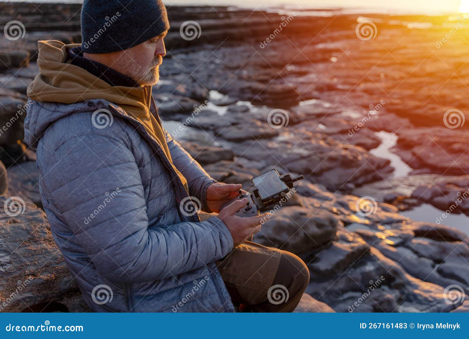 Man Using A Drone With Remote Controller Making Photos And Videos ...