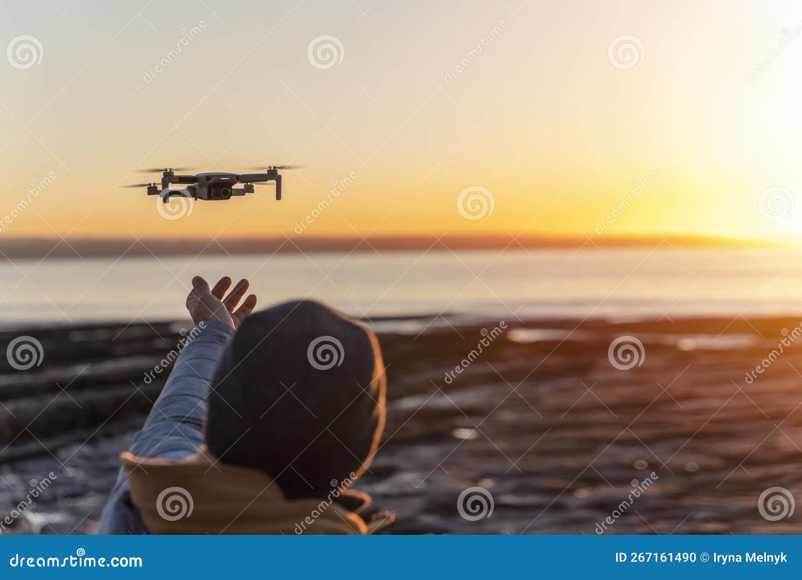 Man Using A Drone With Remote Controller Making Photos And Videos ...