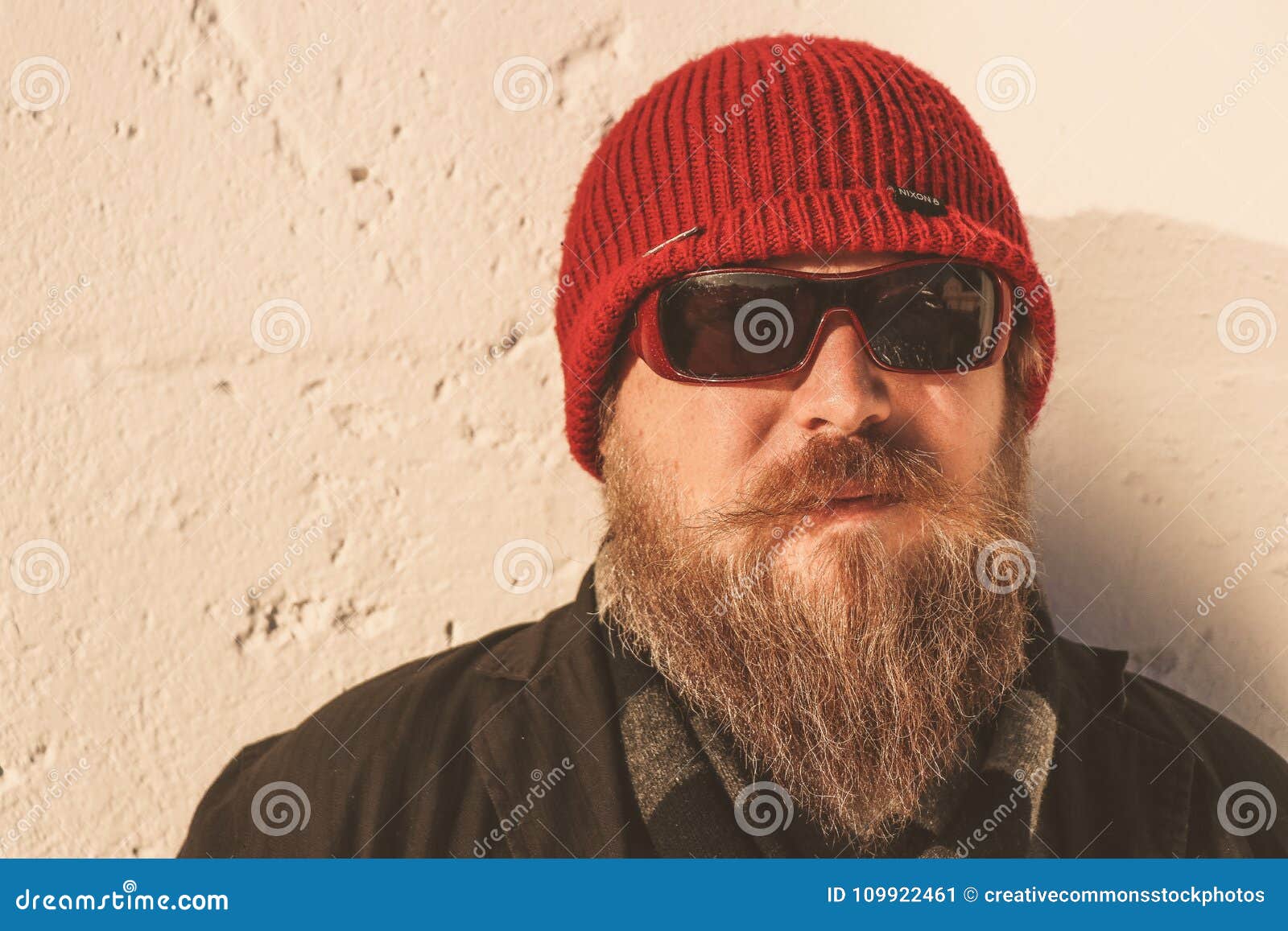 Bearded Man Wearing Red Beanie Cap, Sunglasses ,and Black Jacket ...