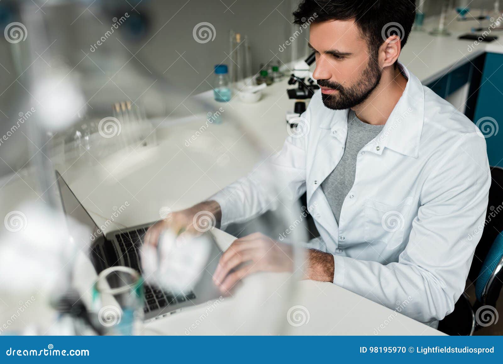 Bearded Scientist Using Laptop in Chemical Laboratory Stock Photo ...