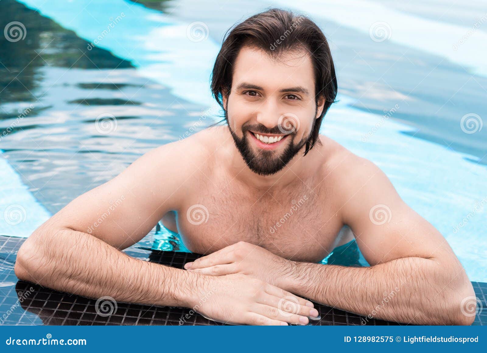 Bearded Smiling Man in Swimming Pool Looking Stock Image - Image of ...