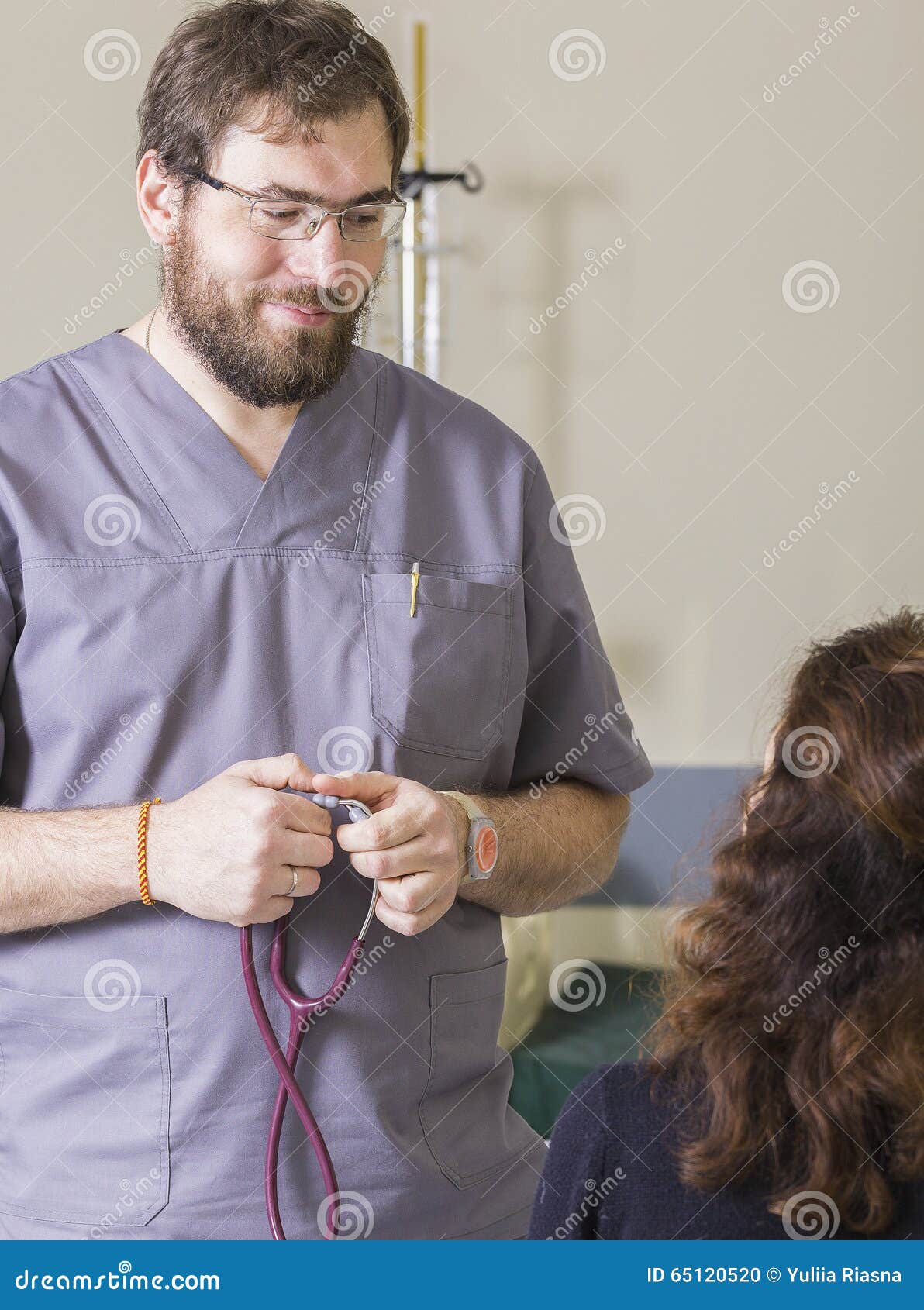 Bearded Young Doctor Talks To a Patient Stock Photo - Image of ...