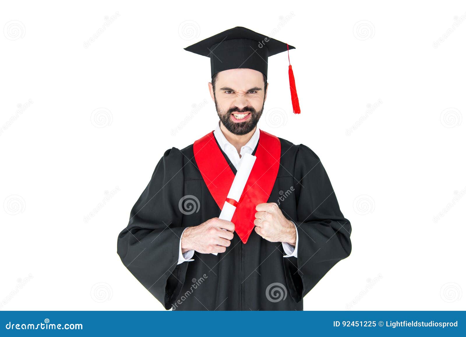 Bearded Young Man in Graduation Hat Holding Diploma and Looking at ...