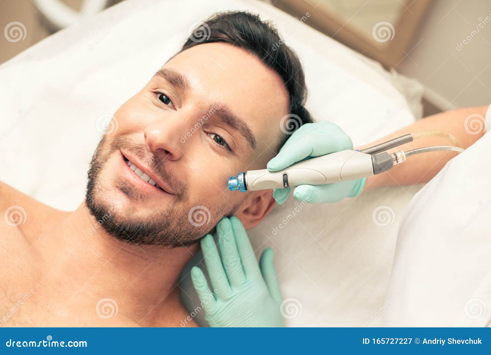 Man Feeling Good during the Skin Moisturizing Procedure Stock Image ...