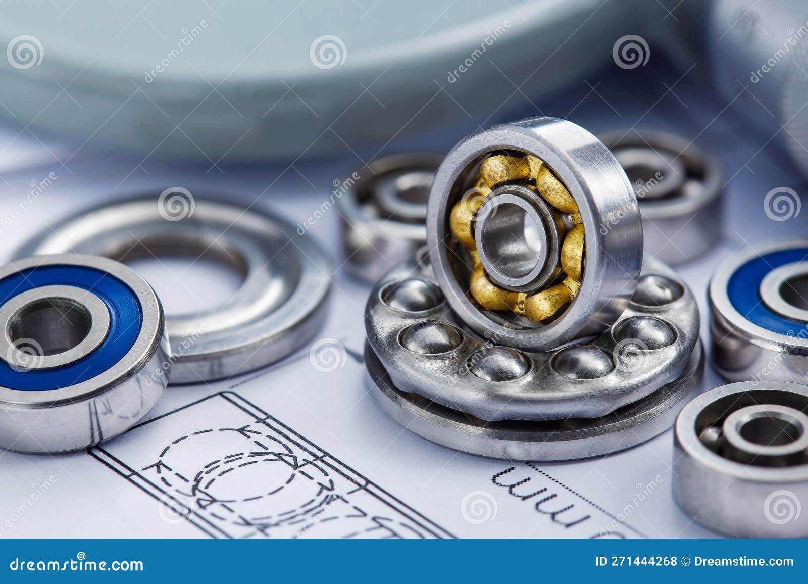 Bearings of Different Types, Micrometer, Caliper and Ruler on the ...