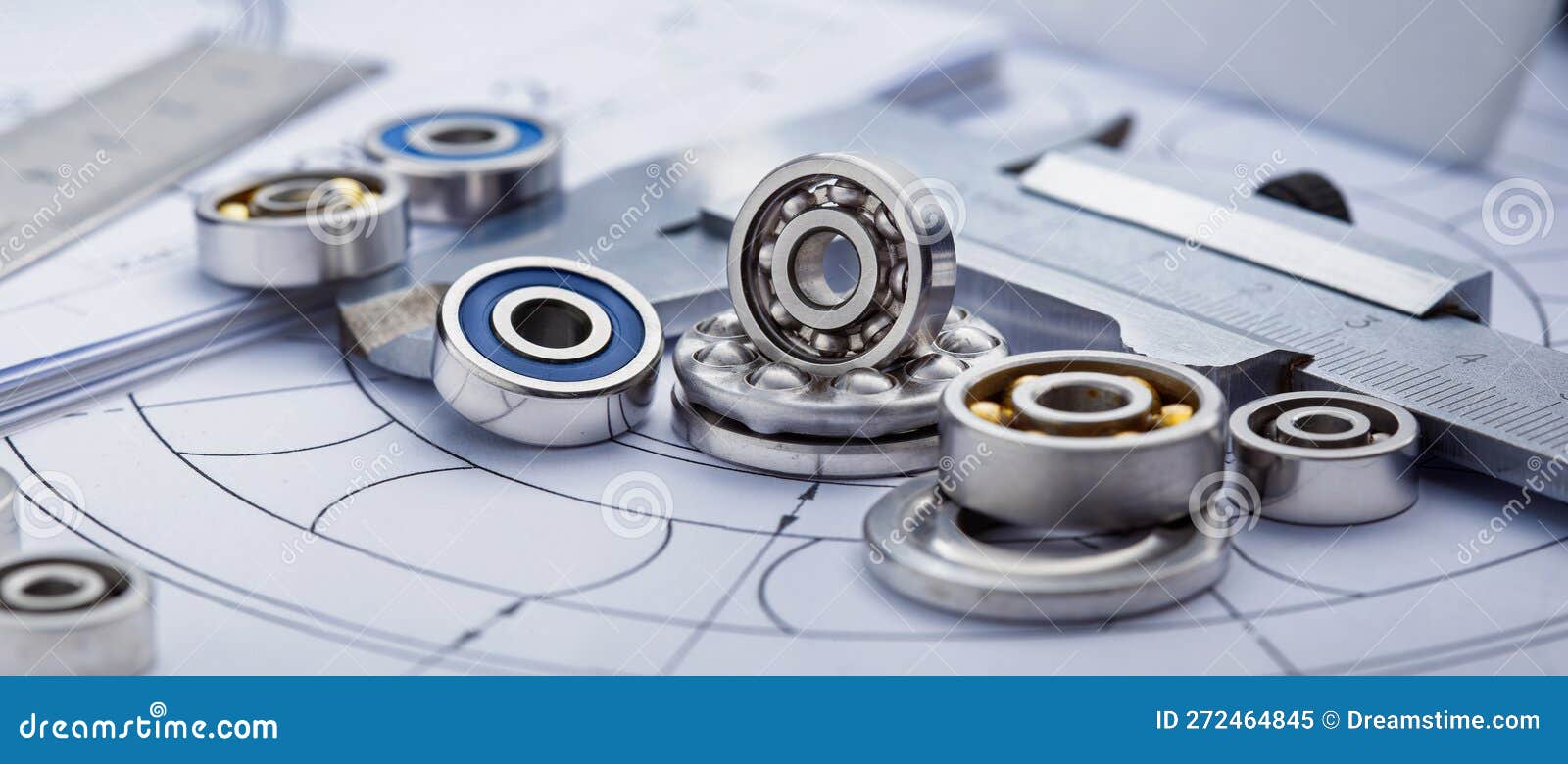 Bearings of Different Types, Micrometer, Caliper and Ruler on the ...