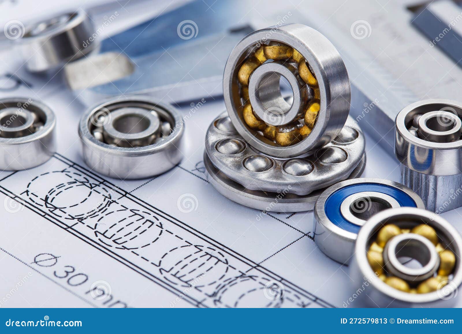 Bearings of Different Types, Micrometer, Caliper and Ruler on the ...