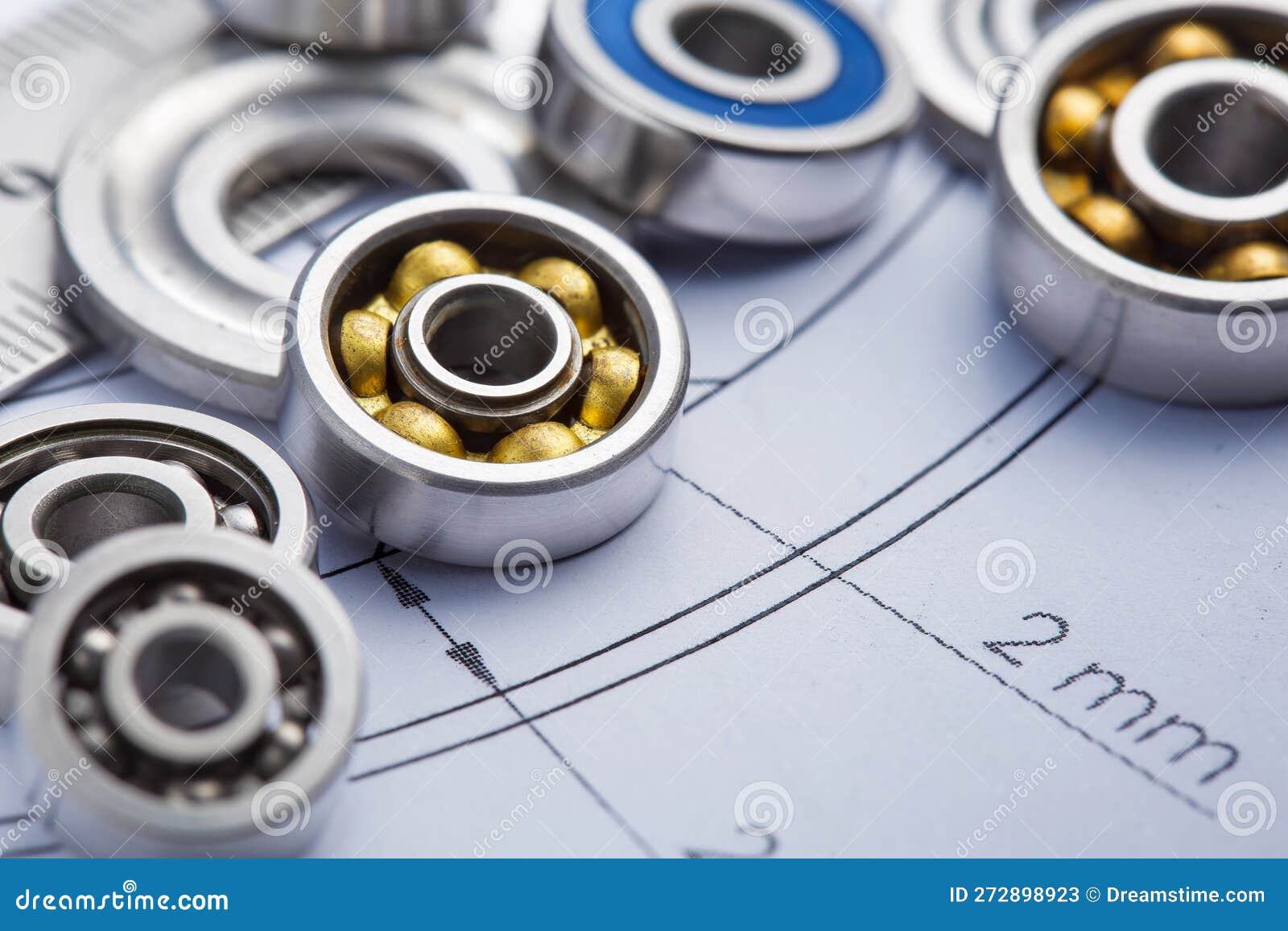 Bearings of Different Types, Micrometer, Caliper and Ruler on the ...