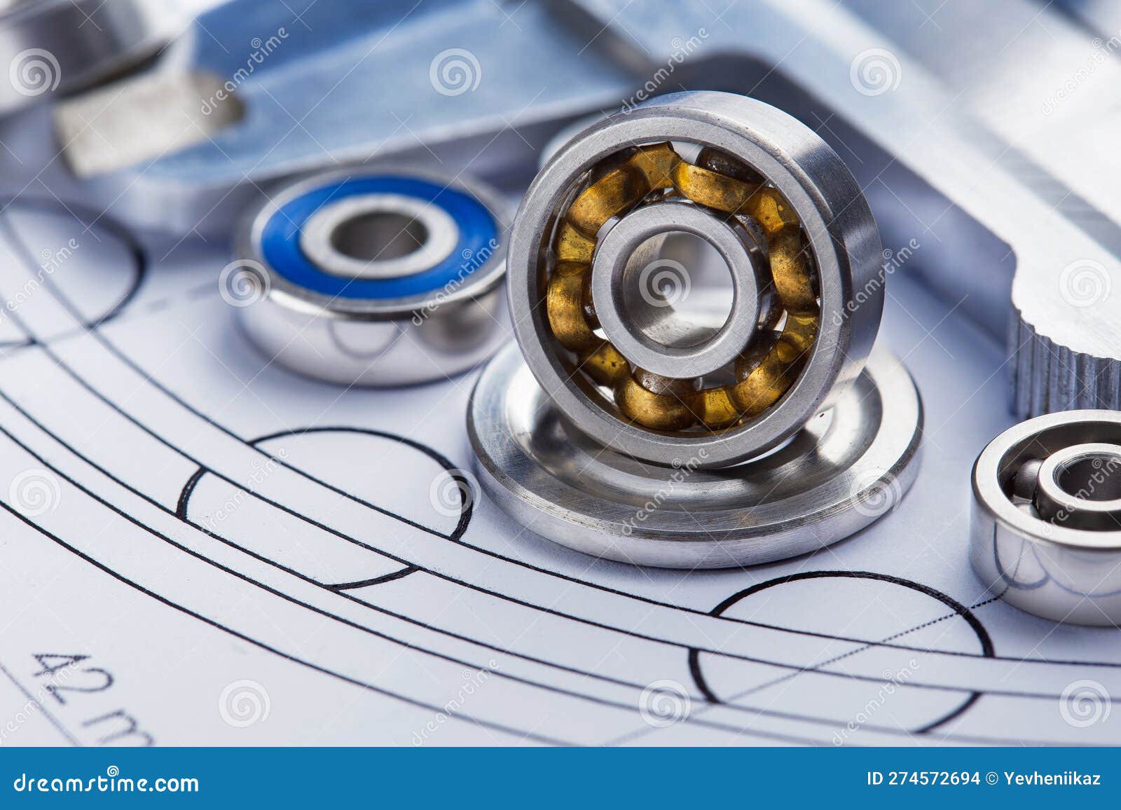 Bearings of Different Types, Micrometer, Caliper and Ruler on the ...